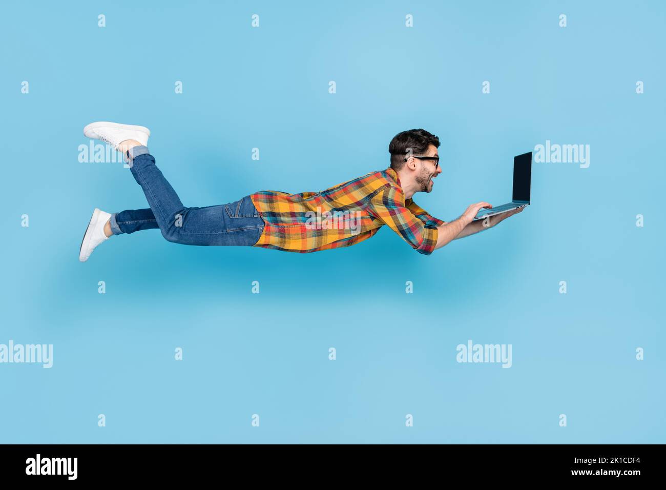 Full size profile photo of flying person use netbook write email ...