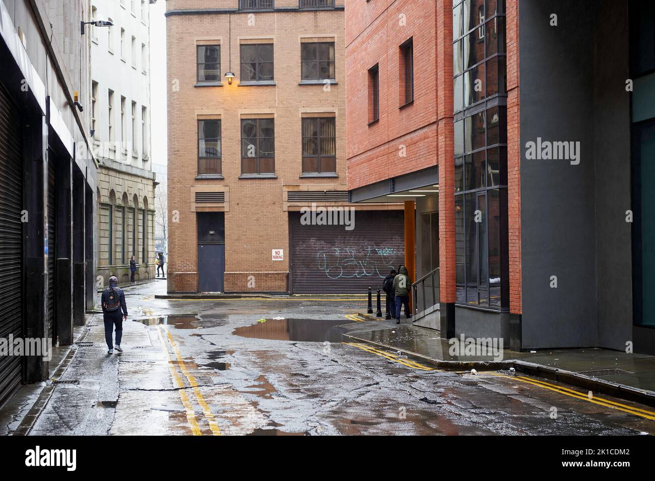Rain, Pedestrians in the rain, Marble Street, Manchester, UK Stock ...