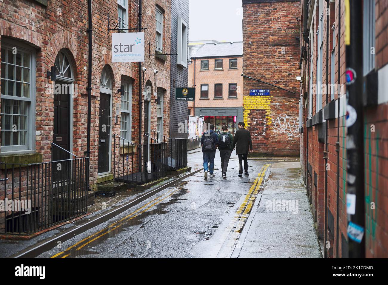 Rain, Pedestrians in the rain, Northern Quarter, Manchester, UK Stock ...