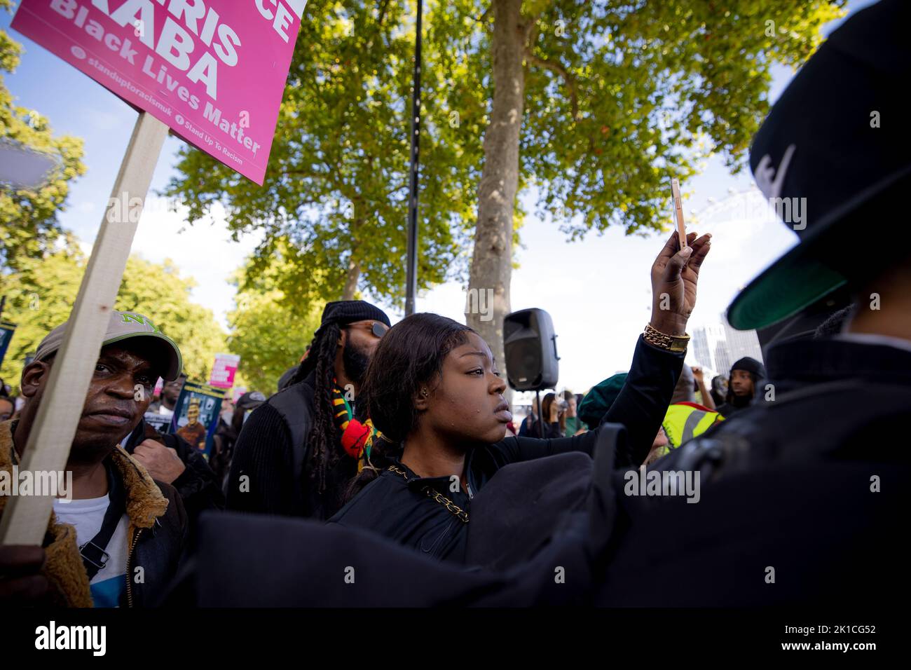 London, UK. 17th Sep, 2022. A protester seen recording the stage with ...