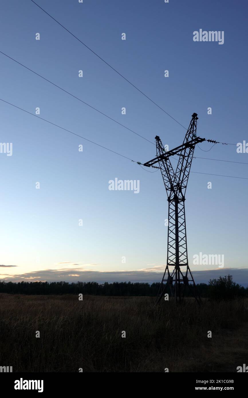 Contour of high-voltage strong power line metal prop with electrical ...