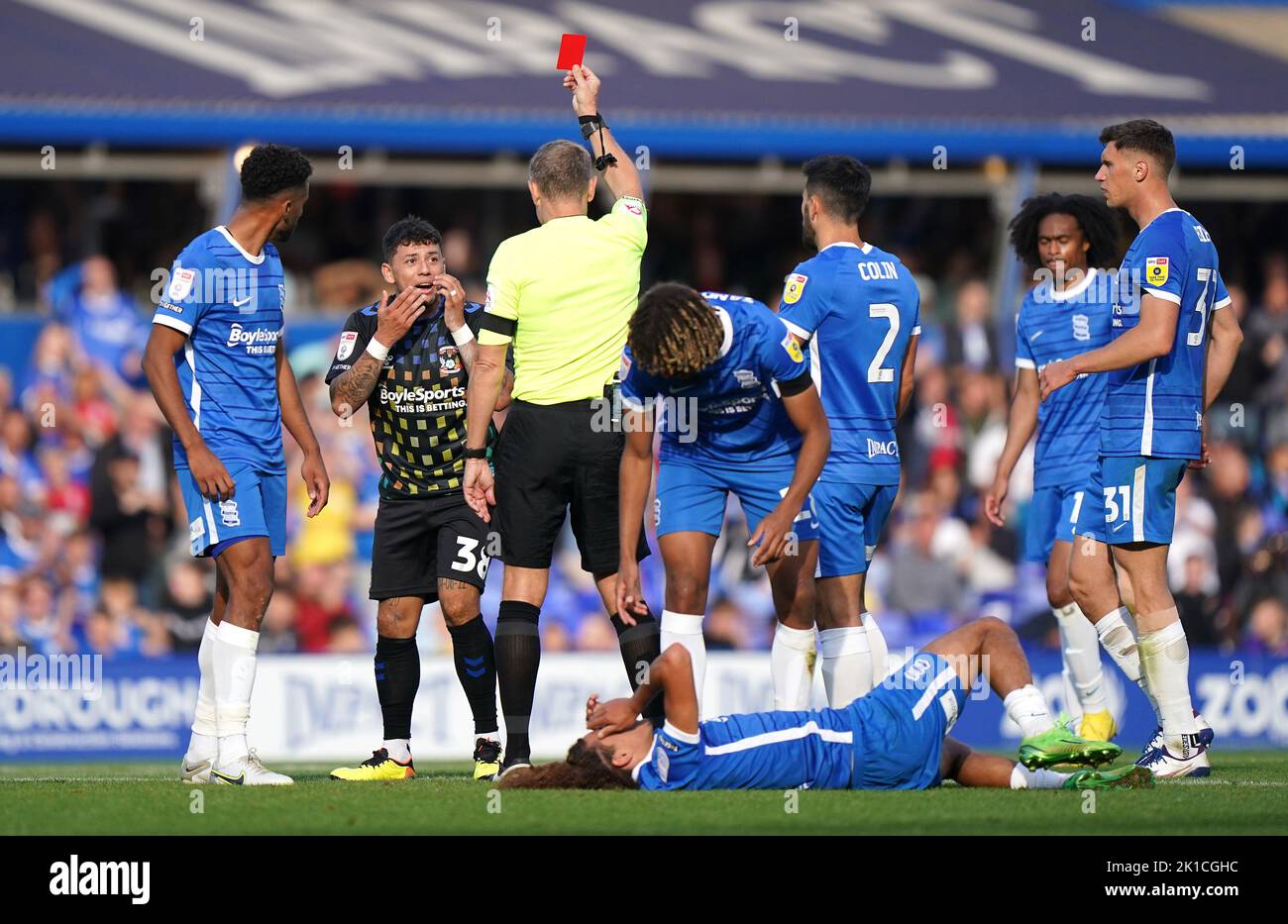 Coventry City's Gustavo Hamer is shown a red card by referee Graham ...