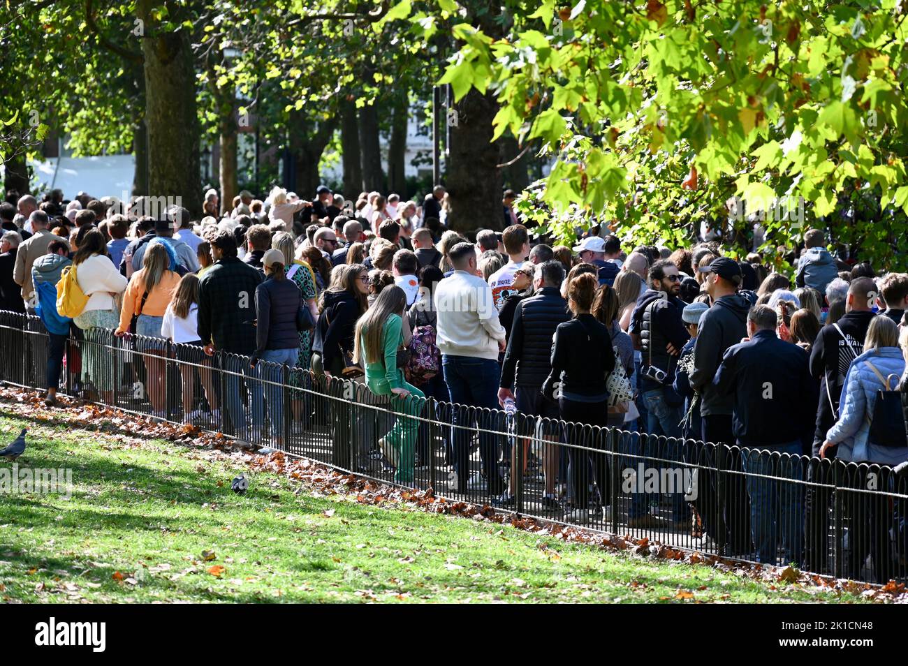 London, UK. Queues form as people leave St James's Park. Members of the ...