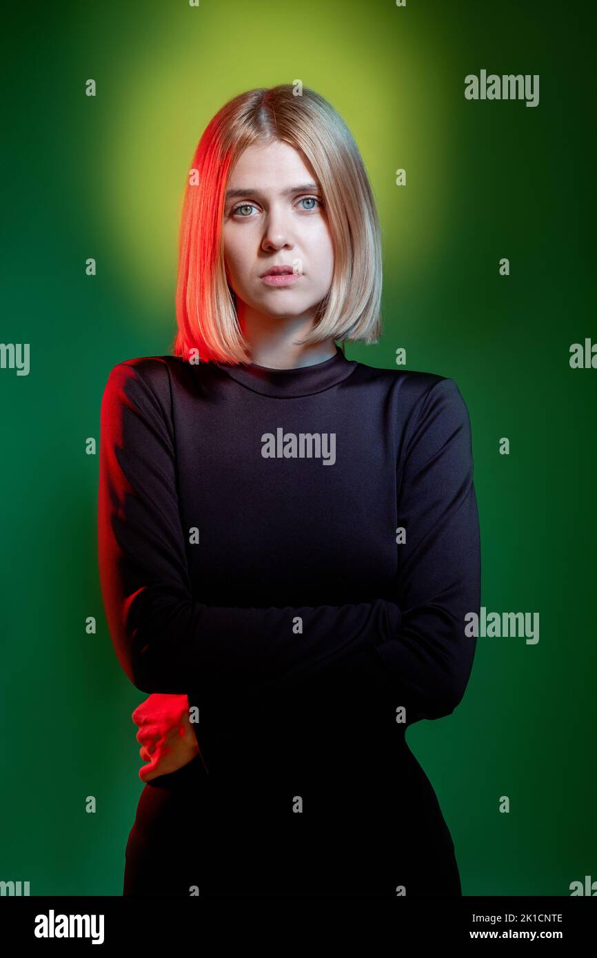 Tired woman portrait. Family abuse. Insecure lady in black dress with ...