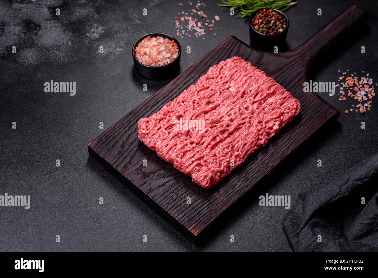 Raw mince beef, ground meat on a black background. Copy space Stock ...