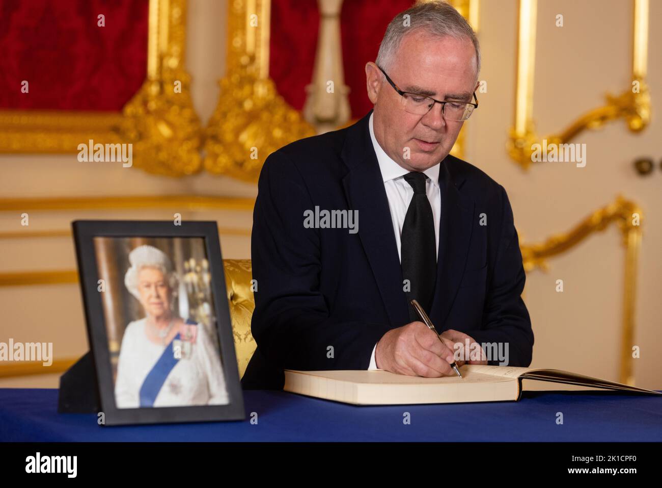 Governor of British Virgin Islands, John Rankin, signs a book of ...