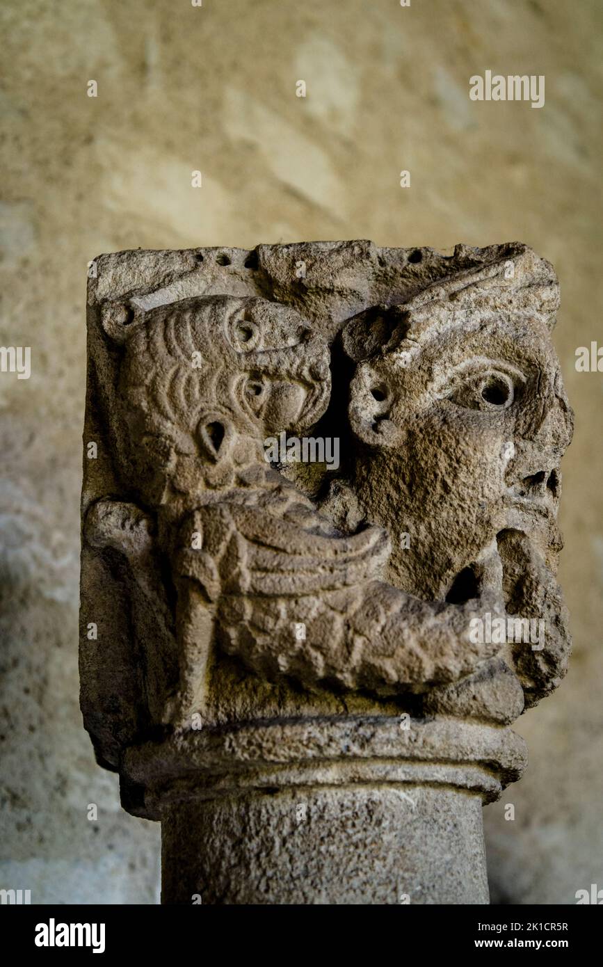 Medieval sculture placed on top of the column or capital in a ...