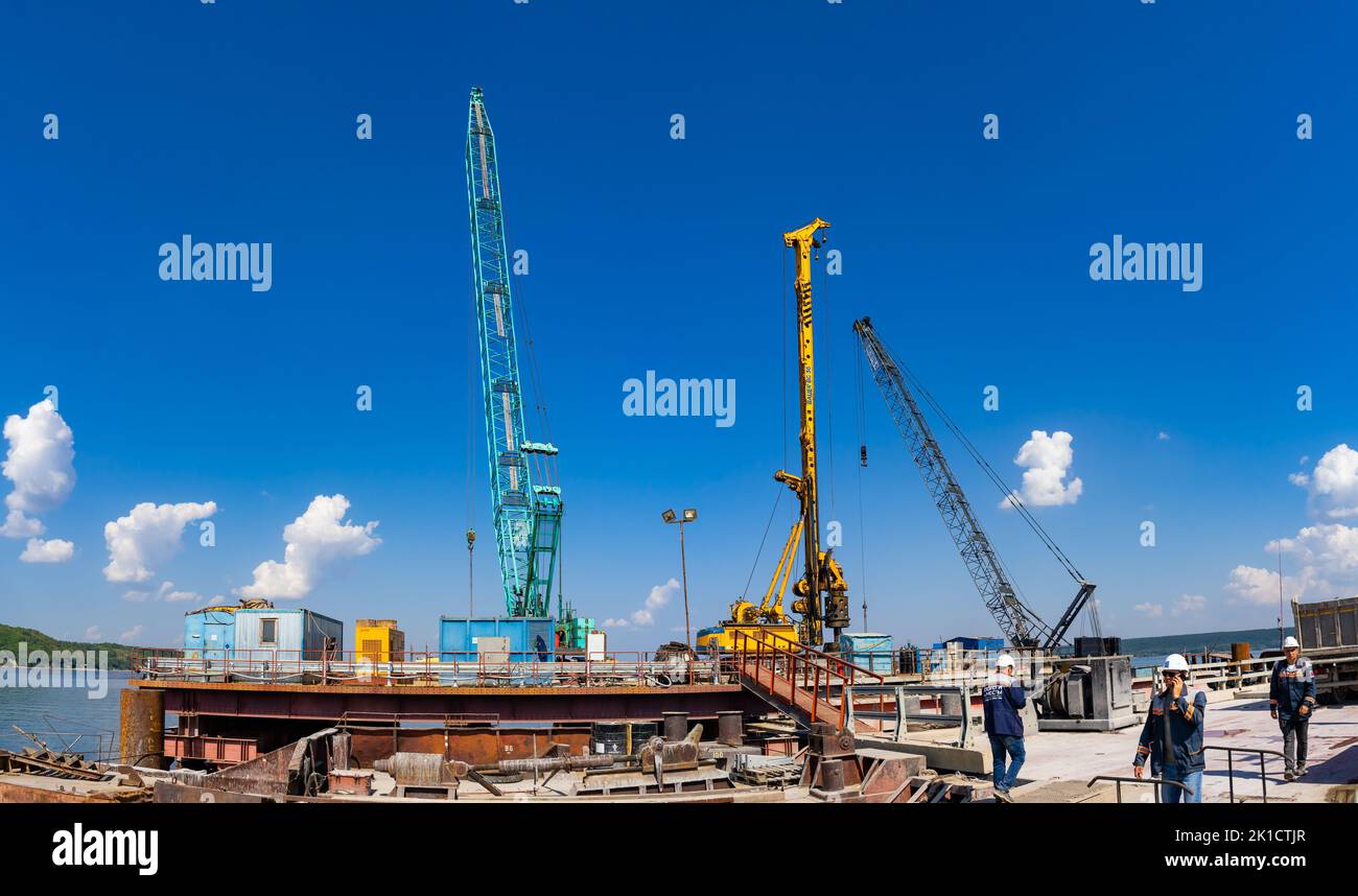 Tatarstan, Russia. August 26, 2022. Cranes and pile-driving machines at ...