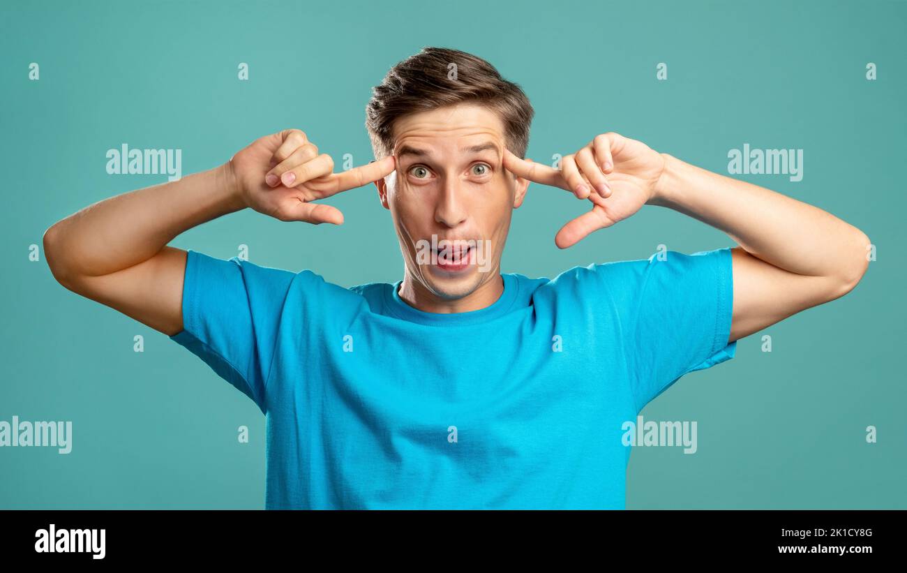 Odd male portrait. Curious fun. Crazy emotion. Young playful man ...