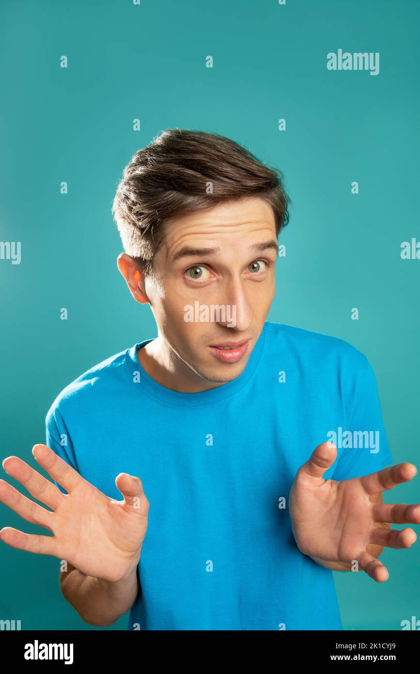 Puzzled man. Unsure emotion. Refusal gesture. You mean what. Clueless ...