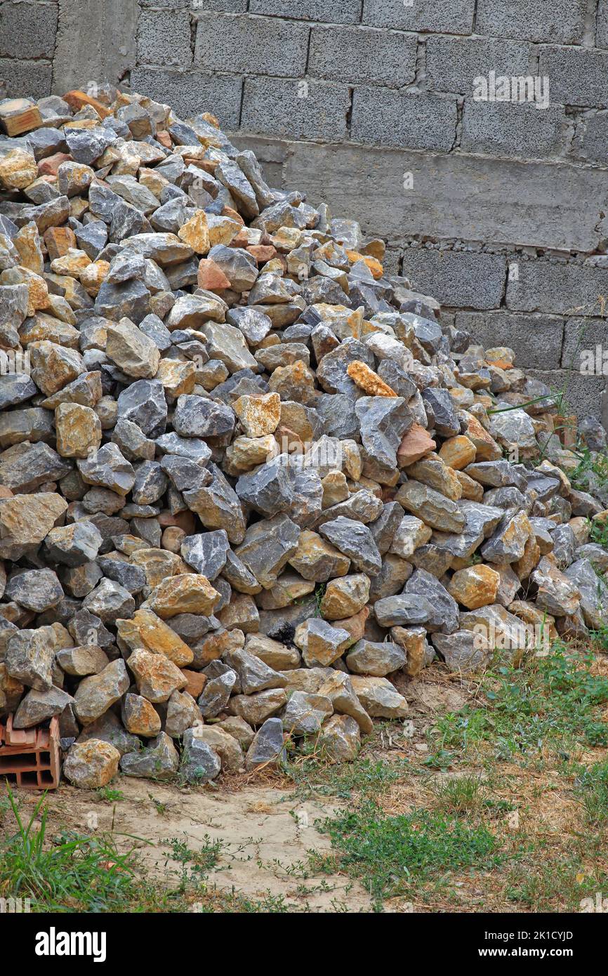 Big pile of aggregate stone material at construction site Stock Photo ...