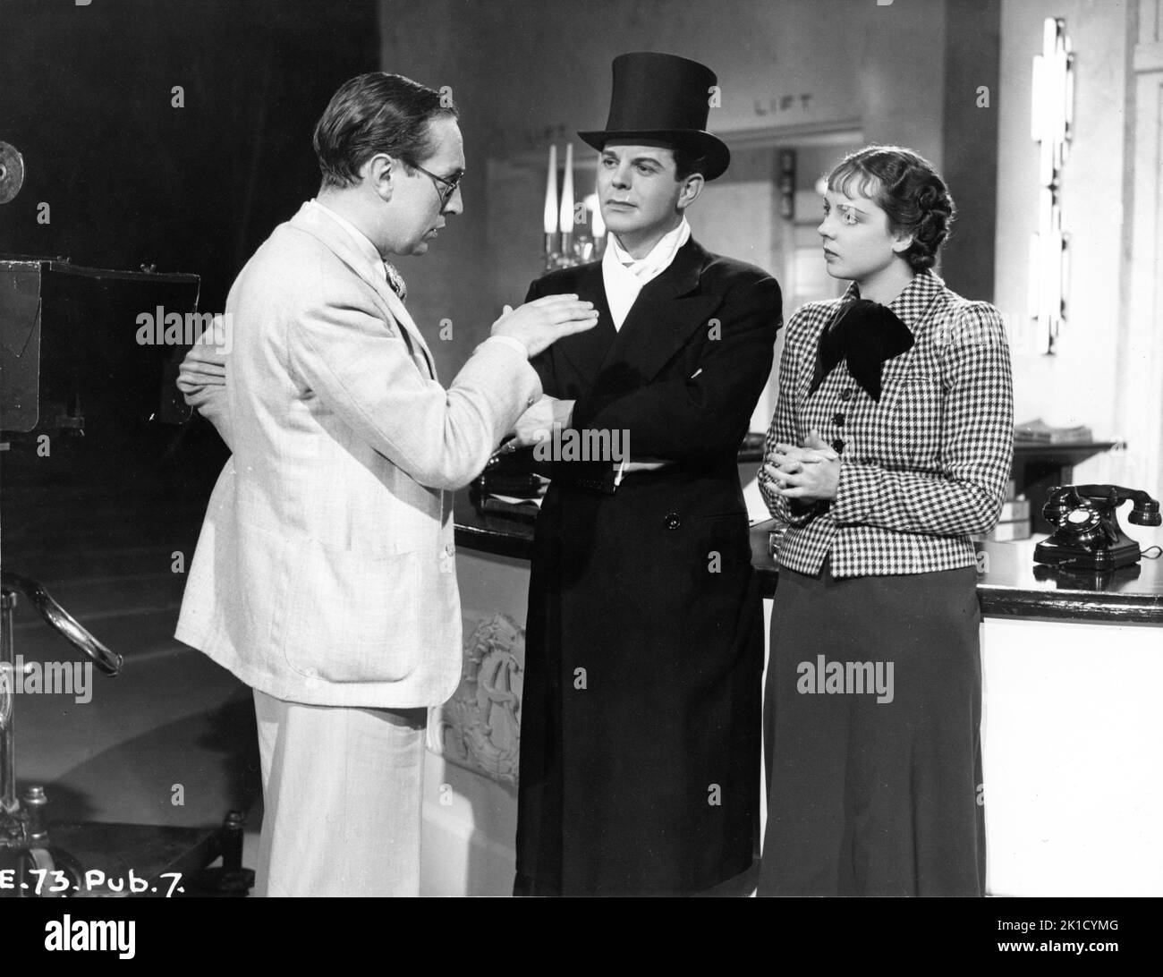 Director SONNIE HALE BARRY MacKAY and JESSIE MATTHEWS on set candid during filming of GANGWAY ...