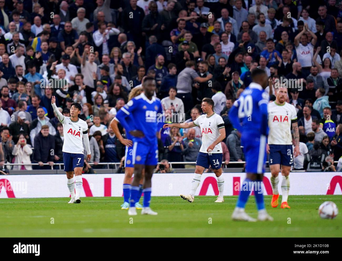Tottenham Hotspur's Son Heung-min (left) celebrates scoring their side ...