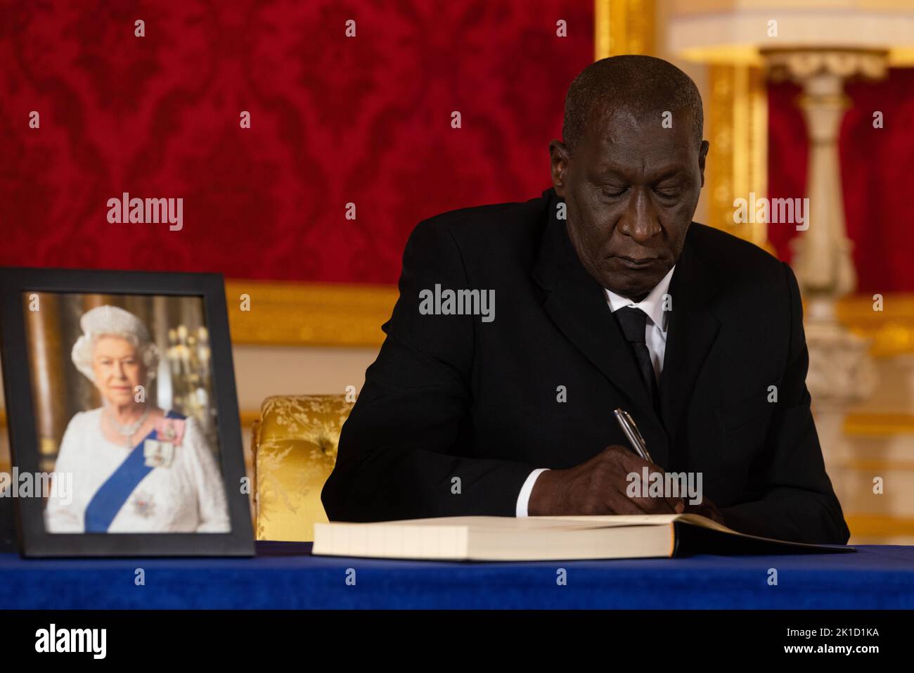 Premier of Montserrat, Joseph E Farrell, signs a book of condolence at ...