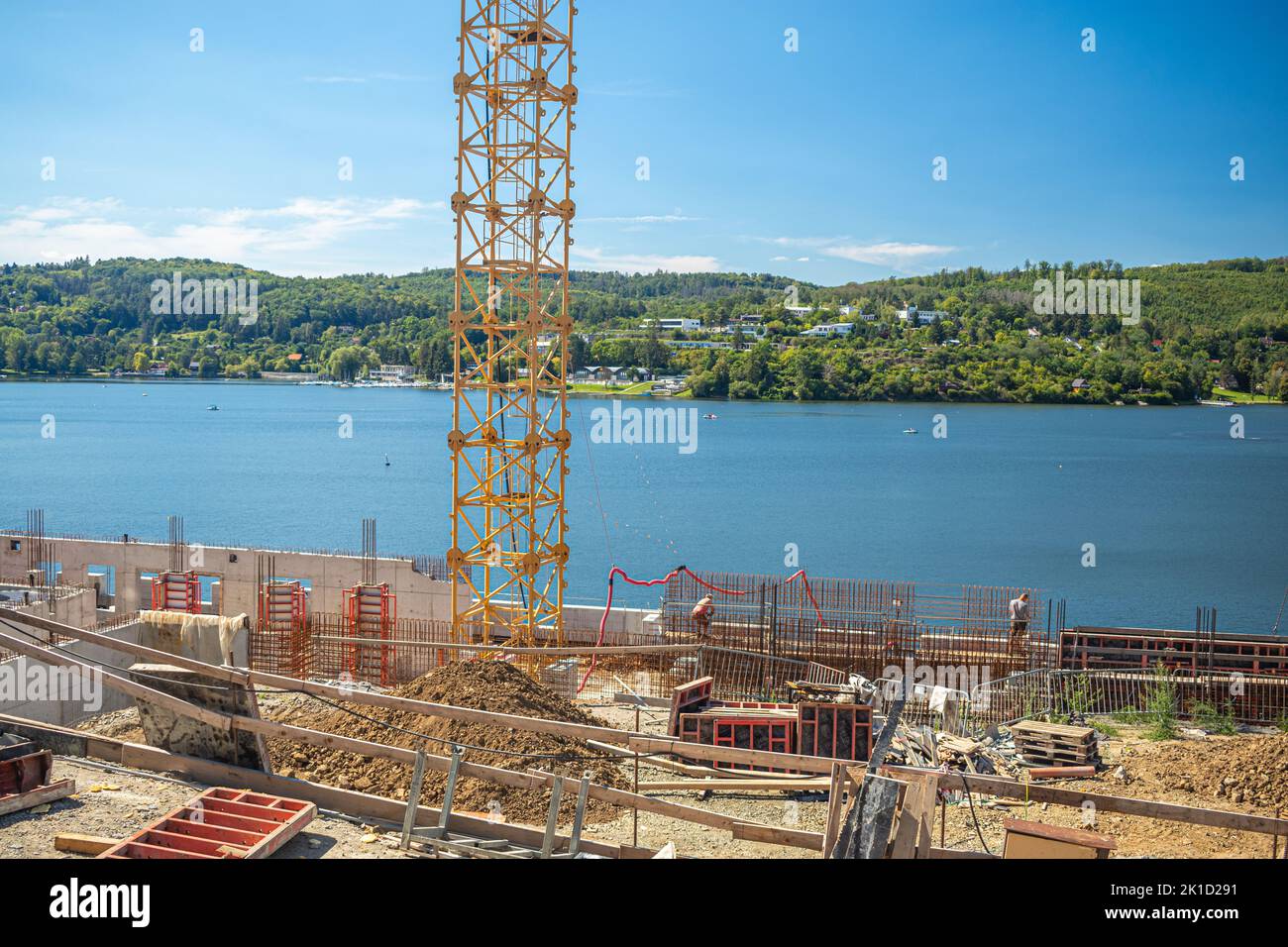 Workers at the construction site. Structural steel beam to build a ...