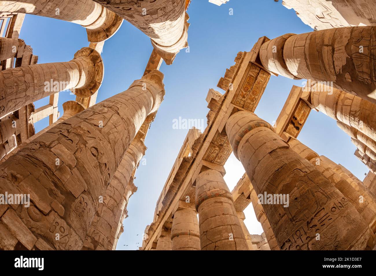 Different hieroglyphs on the walls and columns in the Karnak temple. Karnak temple is the ...