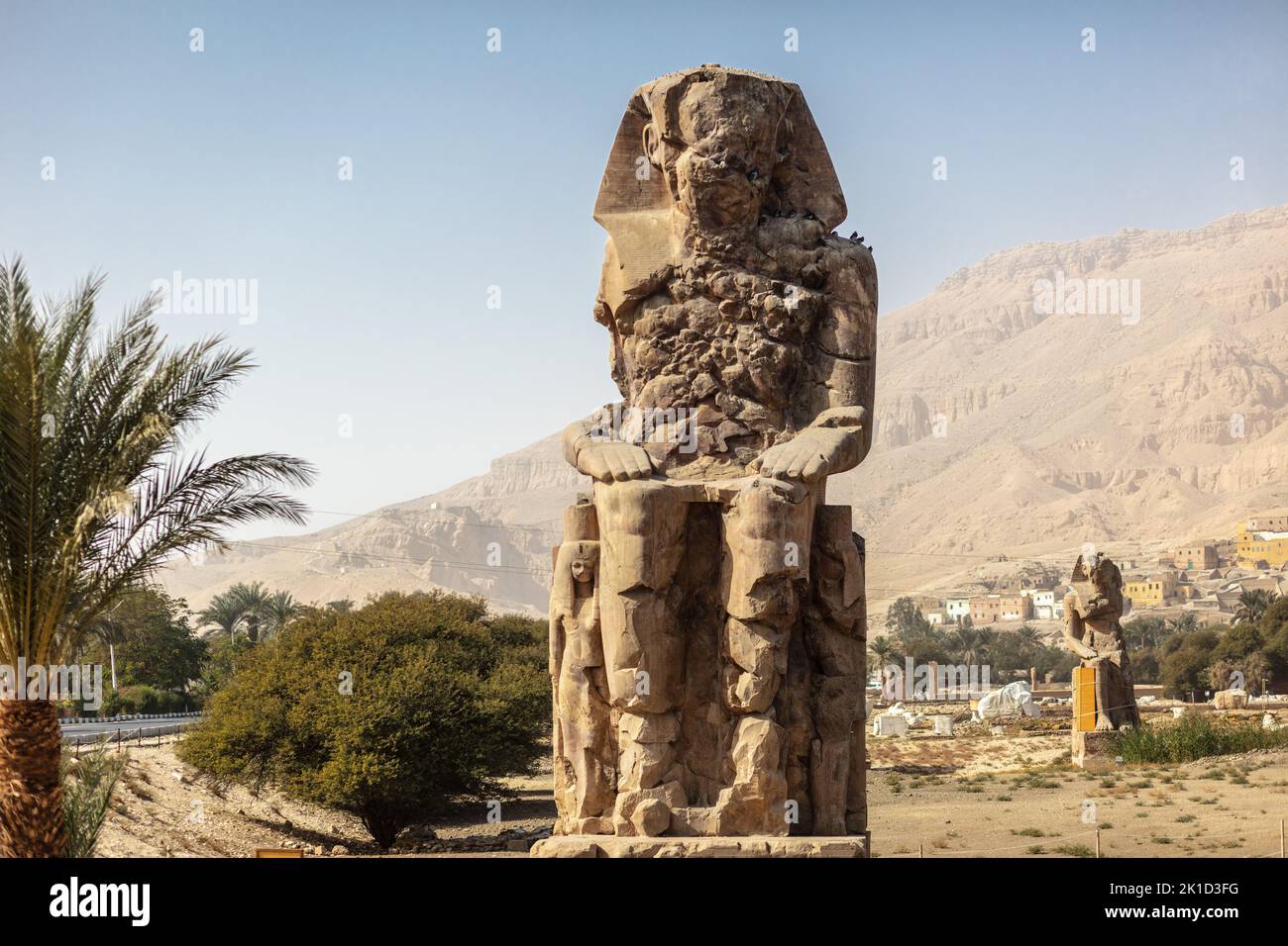 Beautiful daytime view of the Colossi of Memnon. Two large stone ...