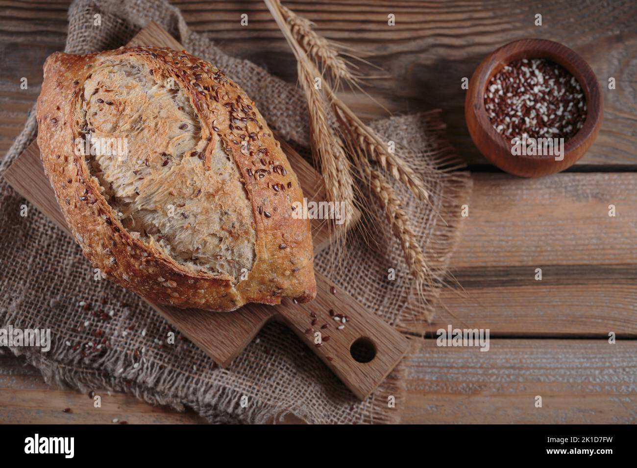Fresh baked whole grain bread with flax seeds Stock Photo - Alamy