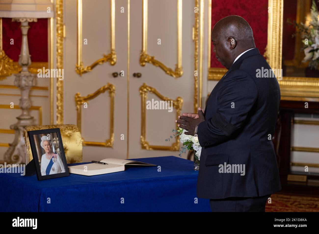 Prime Minister of Bahamas, Philip "Brave" Davis, signs a book of ...