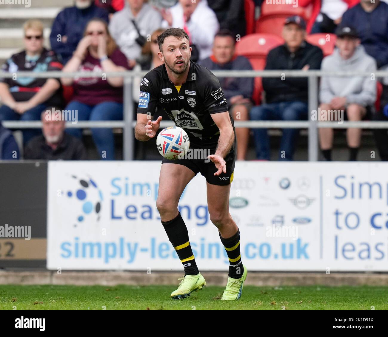 Ryan Brierley #1 of Salford Red Devils passes the ball during the ...