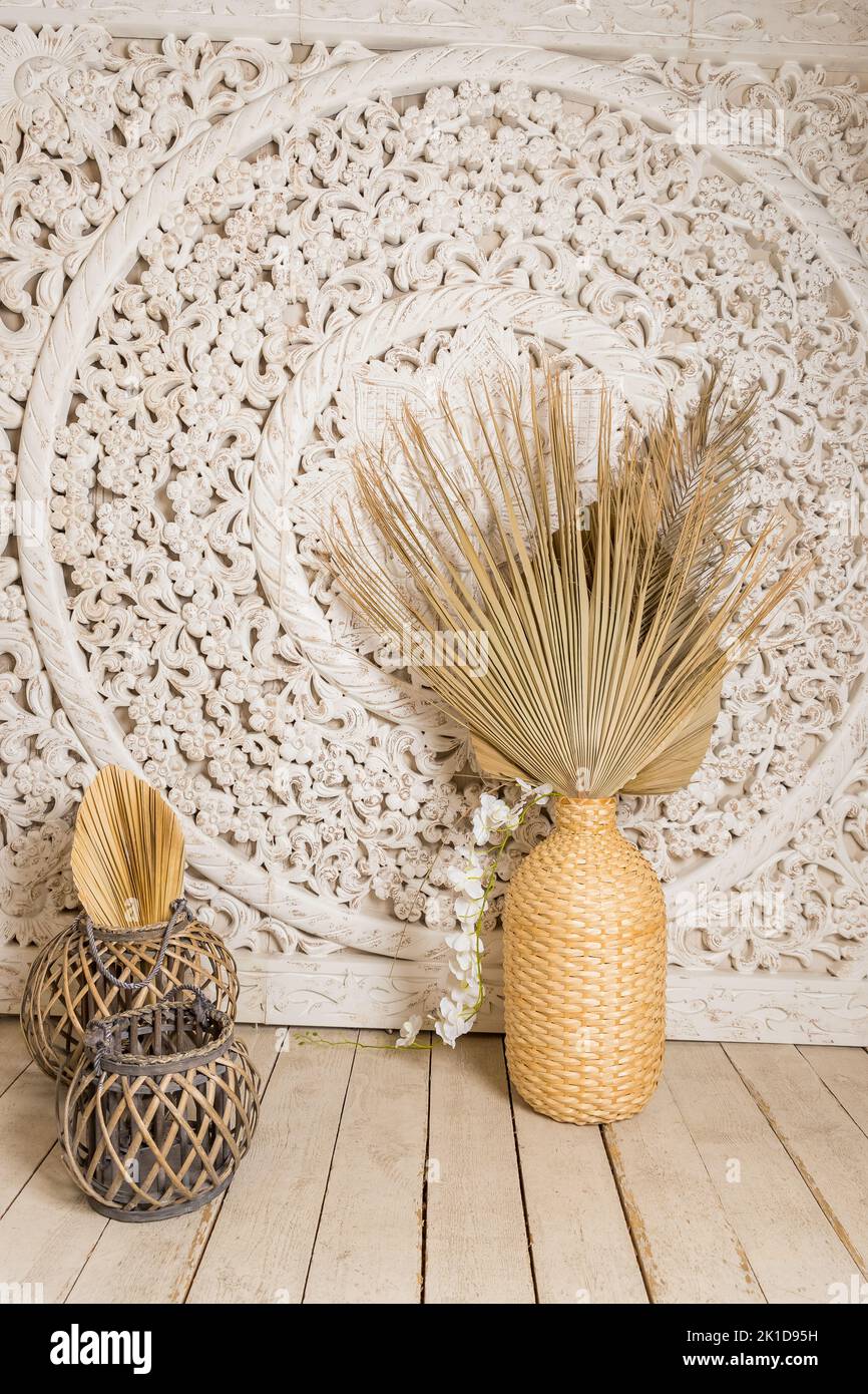 Stylish concept of living room interior with dried leaf in vase, rattan ...