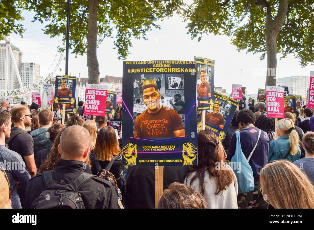 A protester holds a "Justice for Chris Kaba" placard during the ...