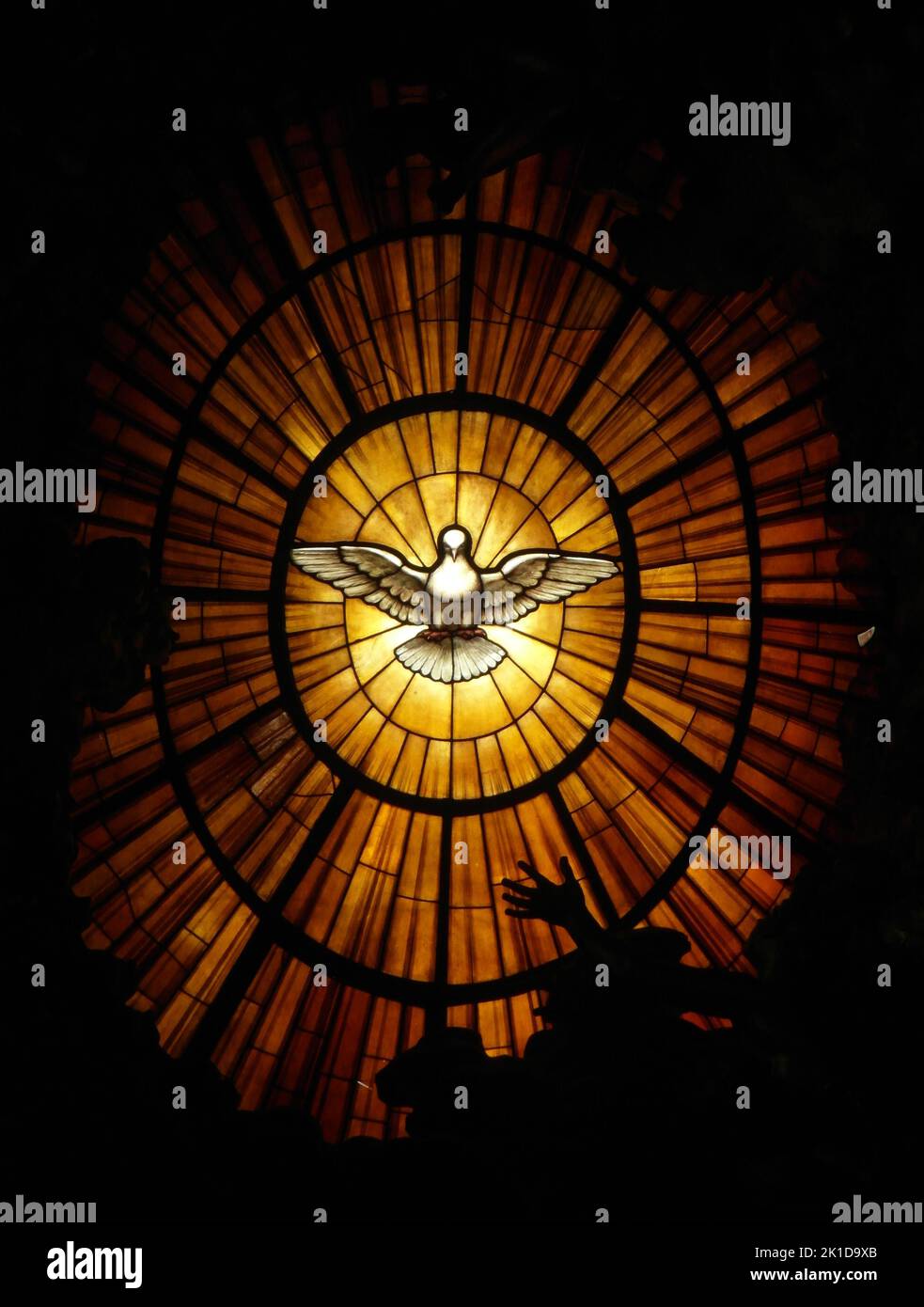 A vertical view of the dove of the Holy Spirit on the stained glass in ...