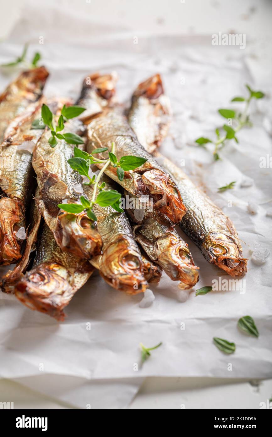 Salty smoked sprats marinated with spices and salt. Smoked fish ...