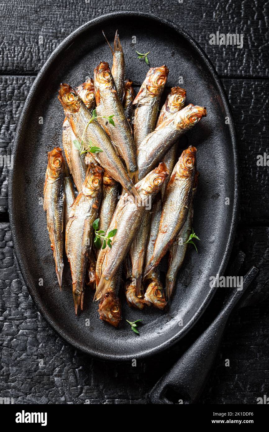 Fresh smoked sprats as popular mediterranean food. Smoked fish ...