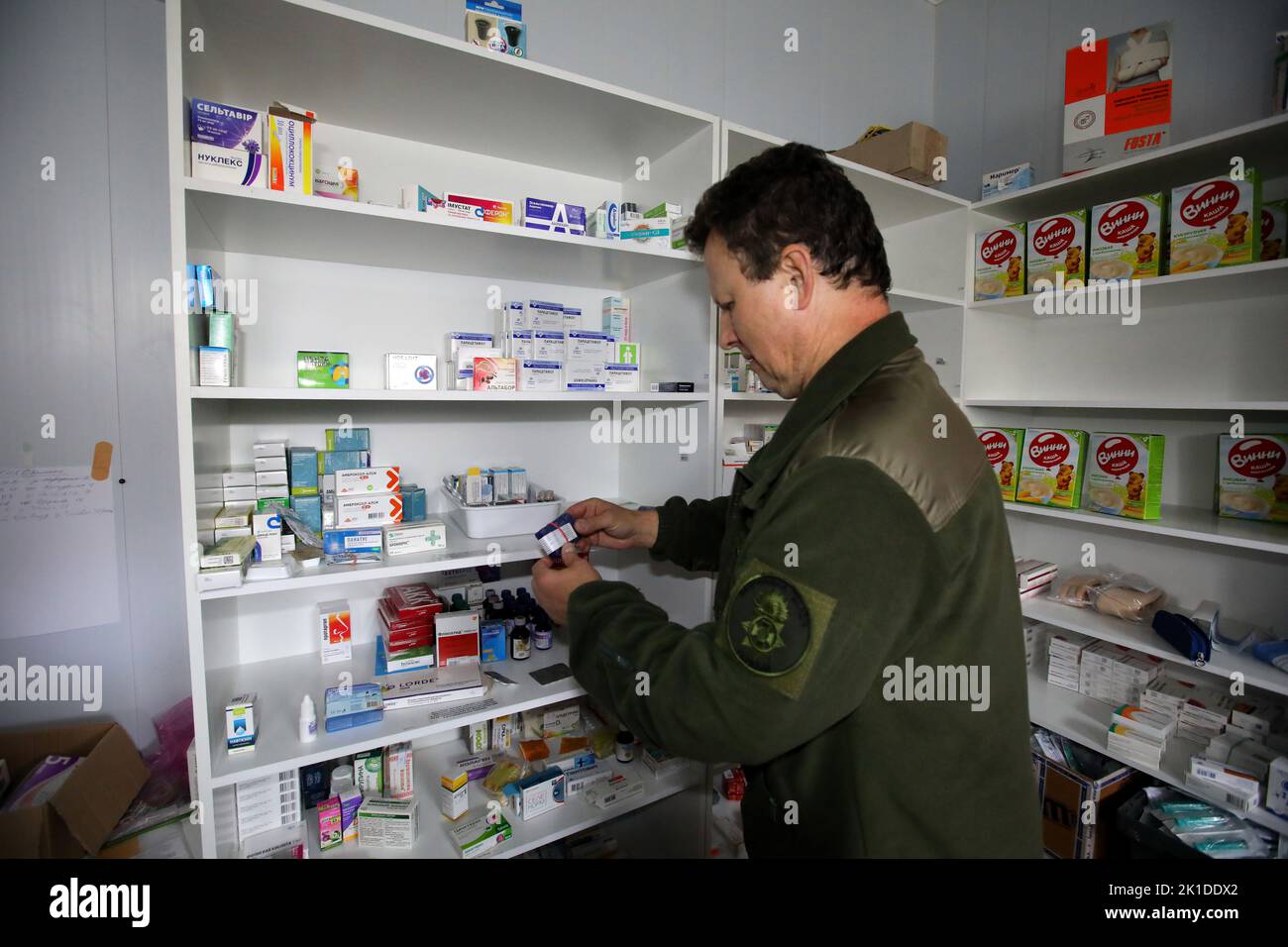 KOZACHA LOPAN, UKRAINE - SEPTEMBER 16, 2022 - A military medic checks ...