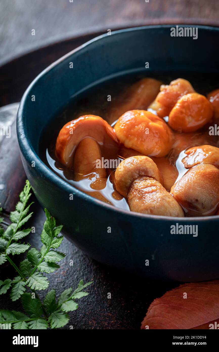 Delicious and sour boletus mushrooms in vinegar pickle. Pickled boletus ...
