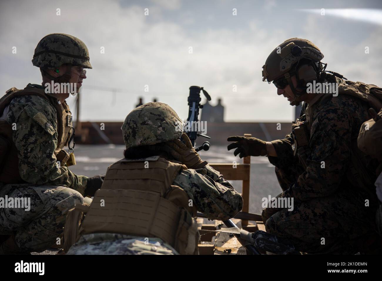 U.S. Navy equipment operator constructionman Ty Mathis and builder ...