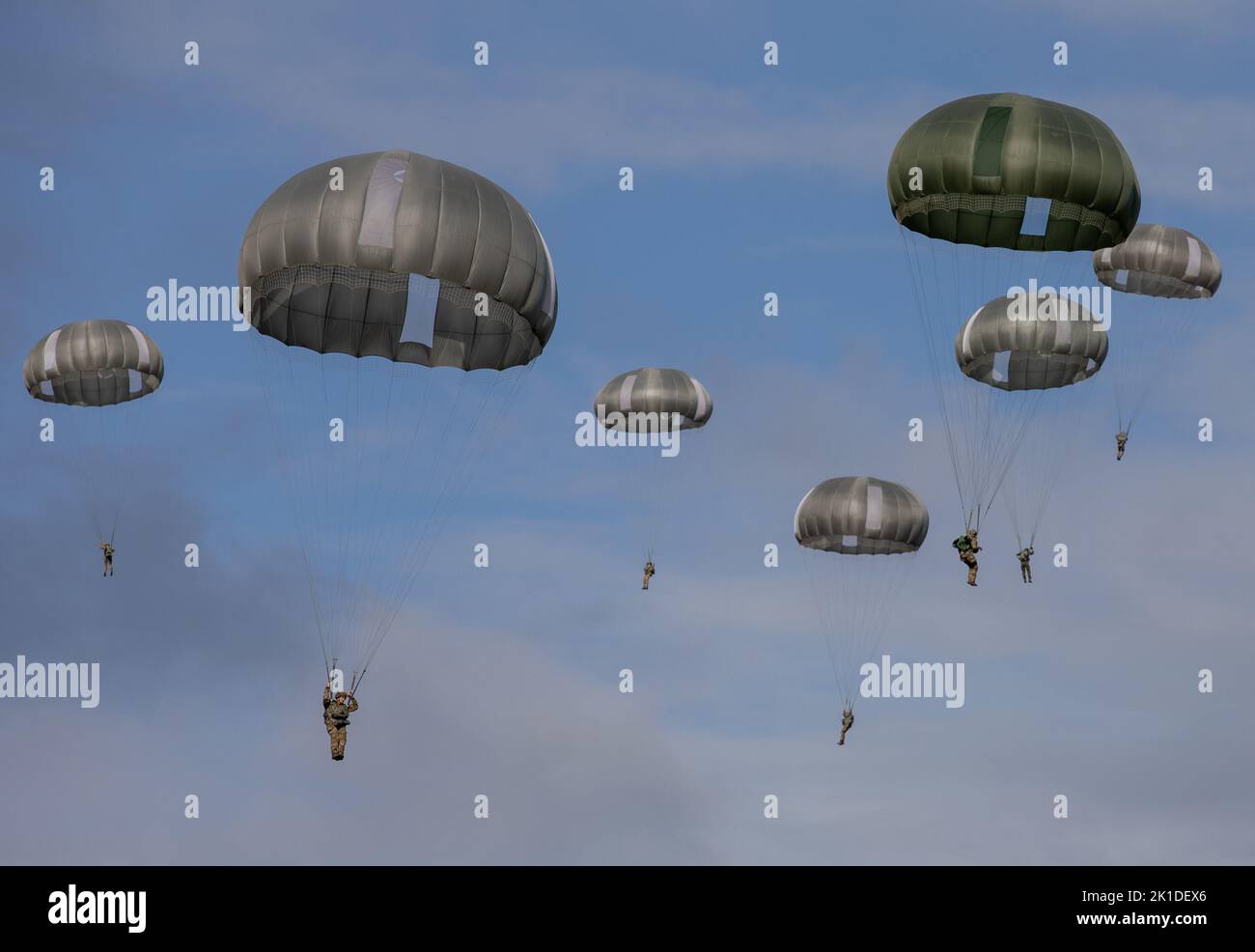 A group of U.S. Army and European Paratroopers descends onto the Drop ...