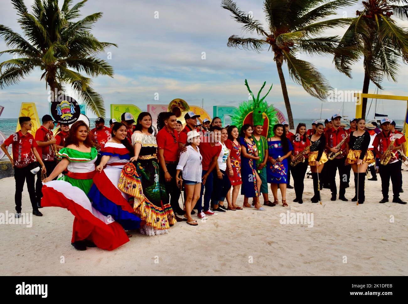 Performers in the Noche Centroamericana parade posing in front of the ...
