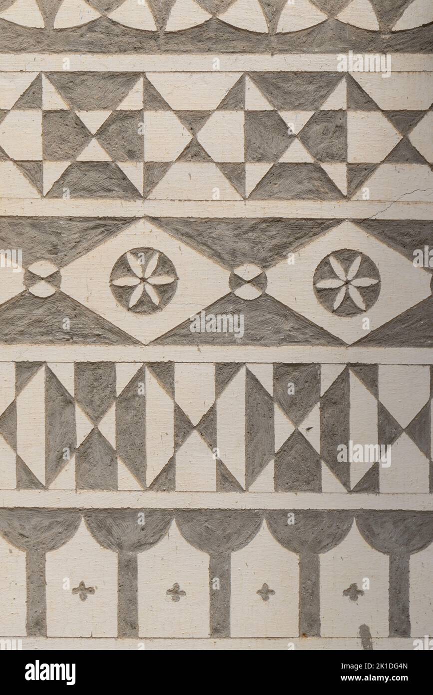 A vertical shot of traditional geometric patterns on the house in the ...