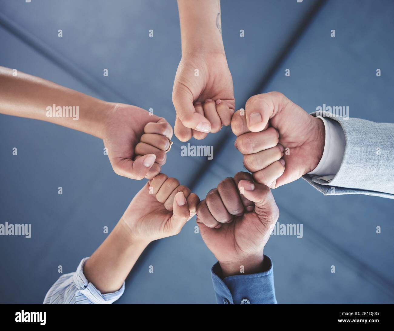 Team success and motivation fist bump of business people with teamwork, work support hand sign ...