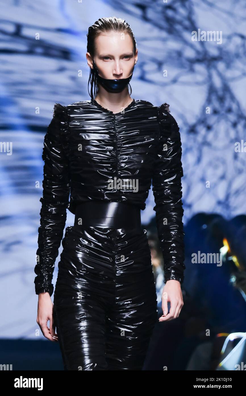 Madrid, Spain. 17th Sep, 2022. A model walks the runway wearing a ...