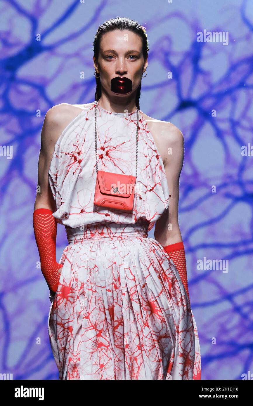 Madrid, Spain. 17th Sep, 2022. A model walks the runway wearing a ...