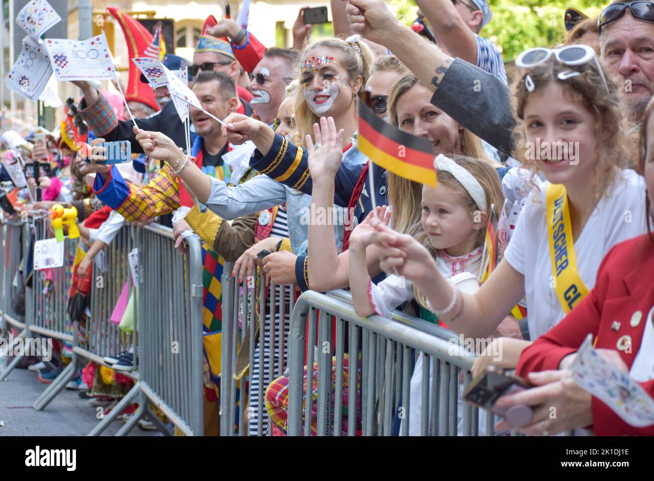Spectators with German flags are seen on Fifth Ave in New York City ...