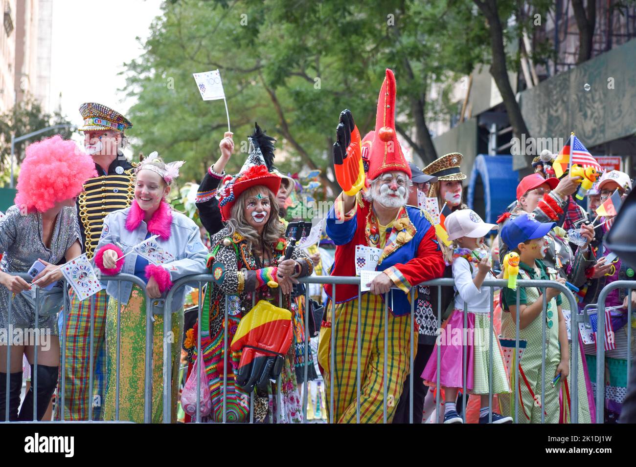 Spectators costumes and with German flags are seen on Fifth Ave in New ...