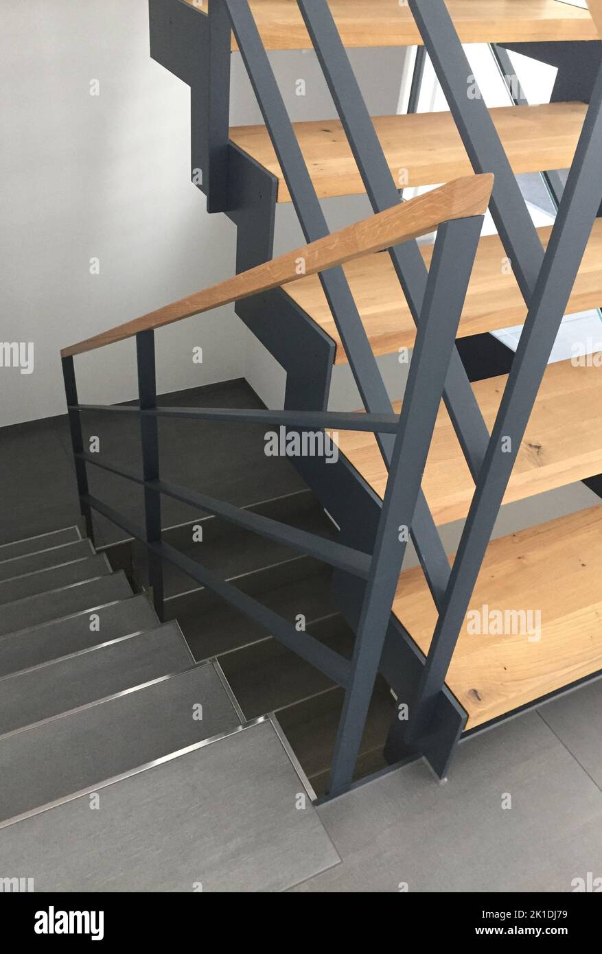 part of concrete and wood-covered staircase Stock Photo - Alamy