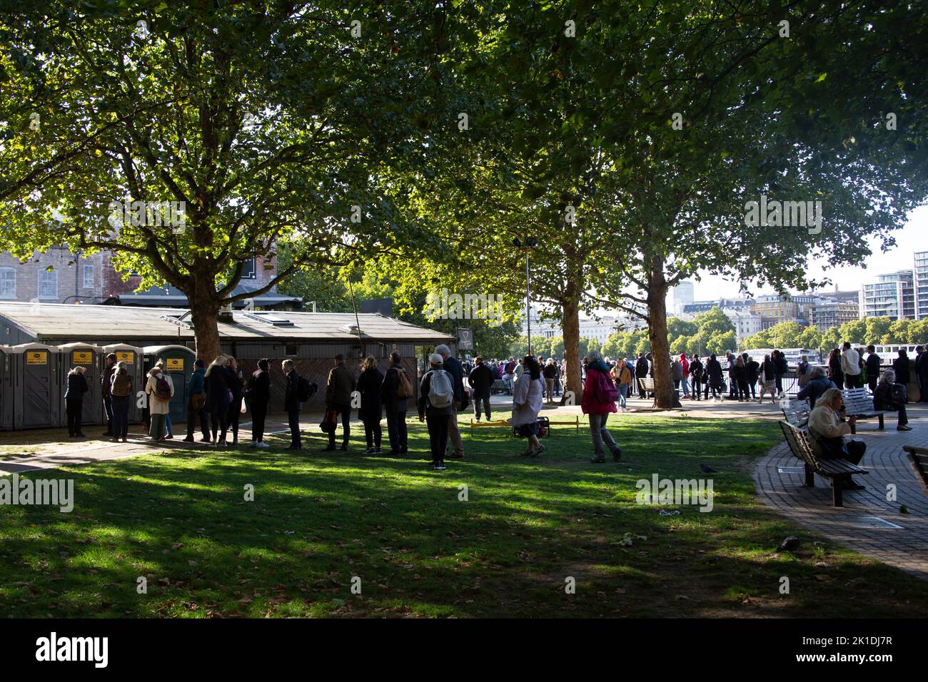 People leave the Queue to see Queen Elizabeth lying in state as it goes ...