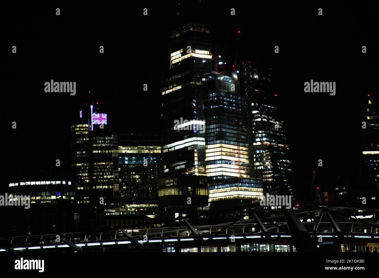 The city of London at night with a union flag as a tribute to the death ...