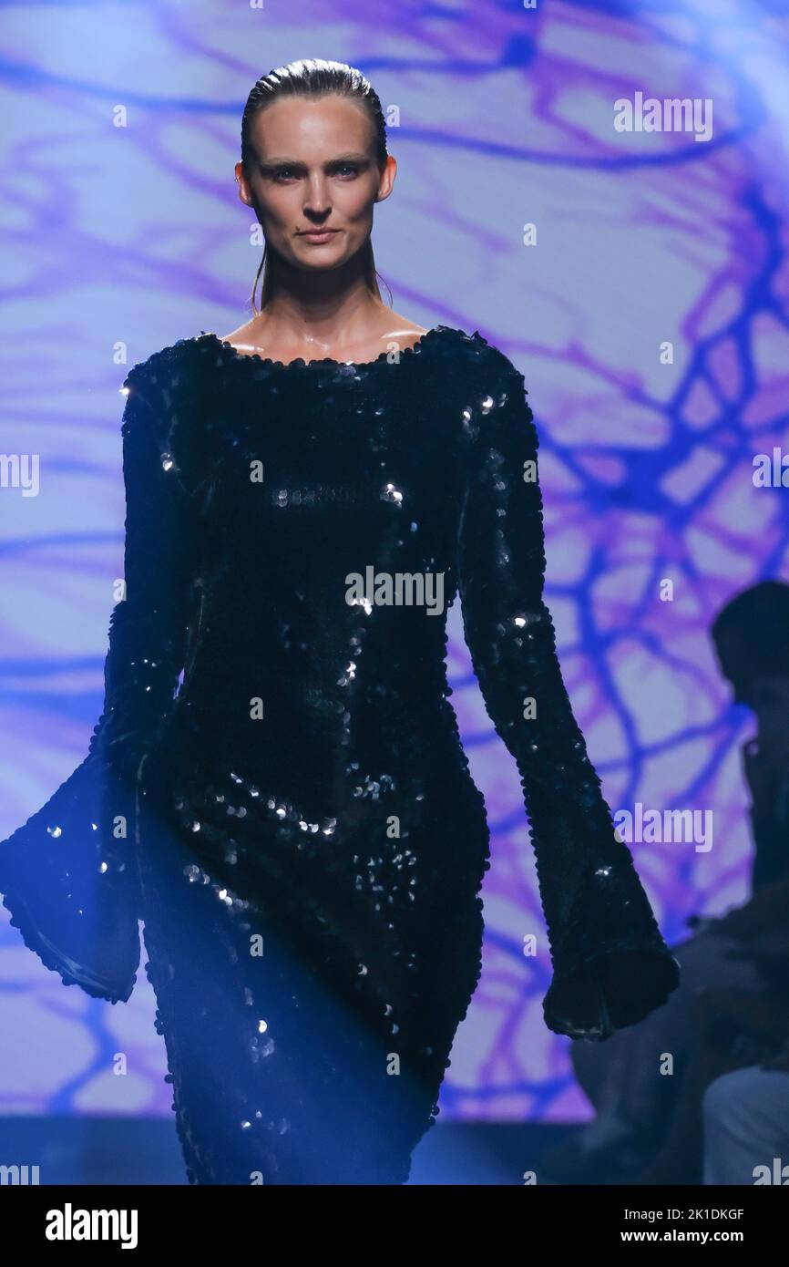 Madrid, Spain. 17th Sep, 2022. A model walks the runway wearing a ...