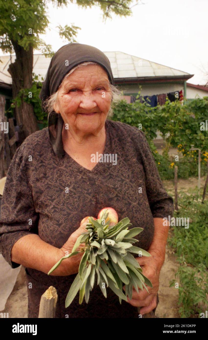 Greci, Tulcea County, Romania, 2000. Elderly woman in her vegetable ...