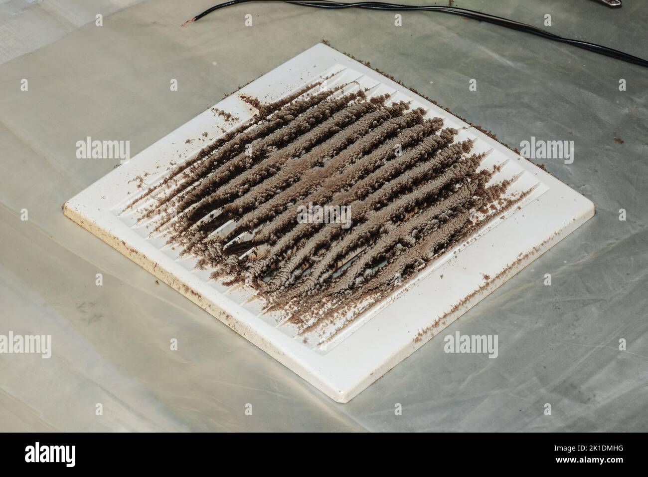 Close-up of a very dirty kitchen exhaust fan. Fan before preventive ...