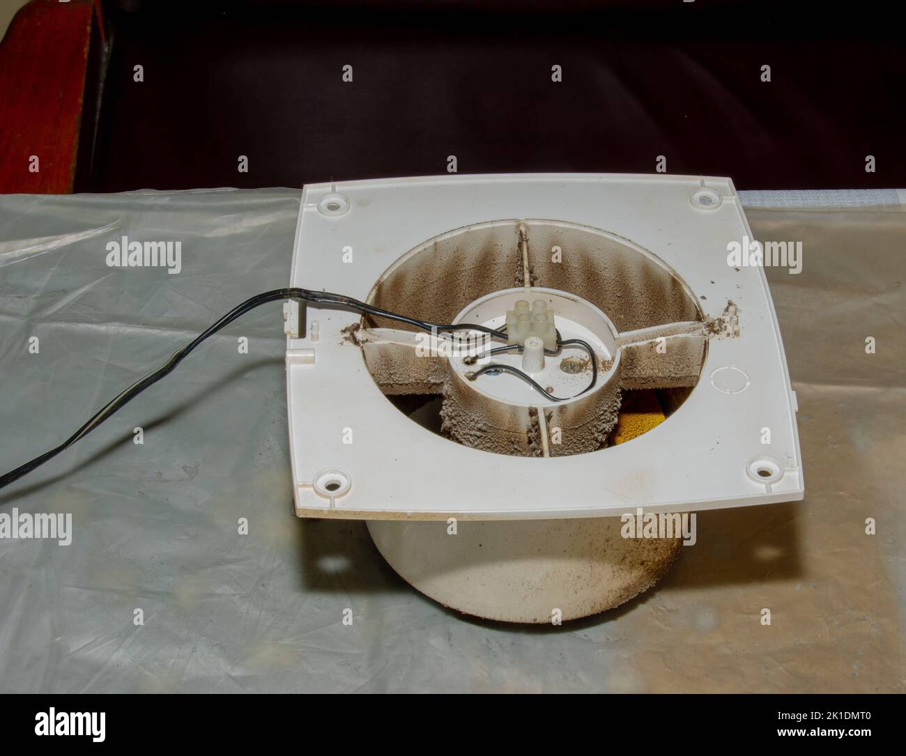 Close-up of a very dirty kitchen exhaust fan. Fan before preventive ...