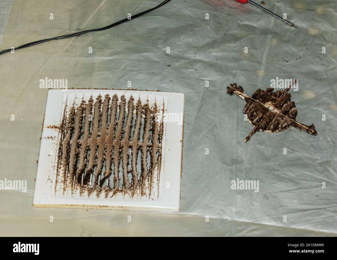 Close-up of a very dirty kitchen exhaust fan. Fan before preventive ...