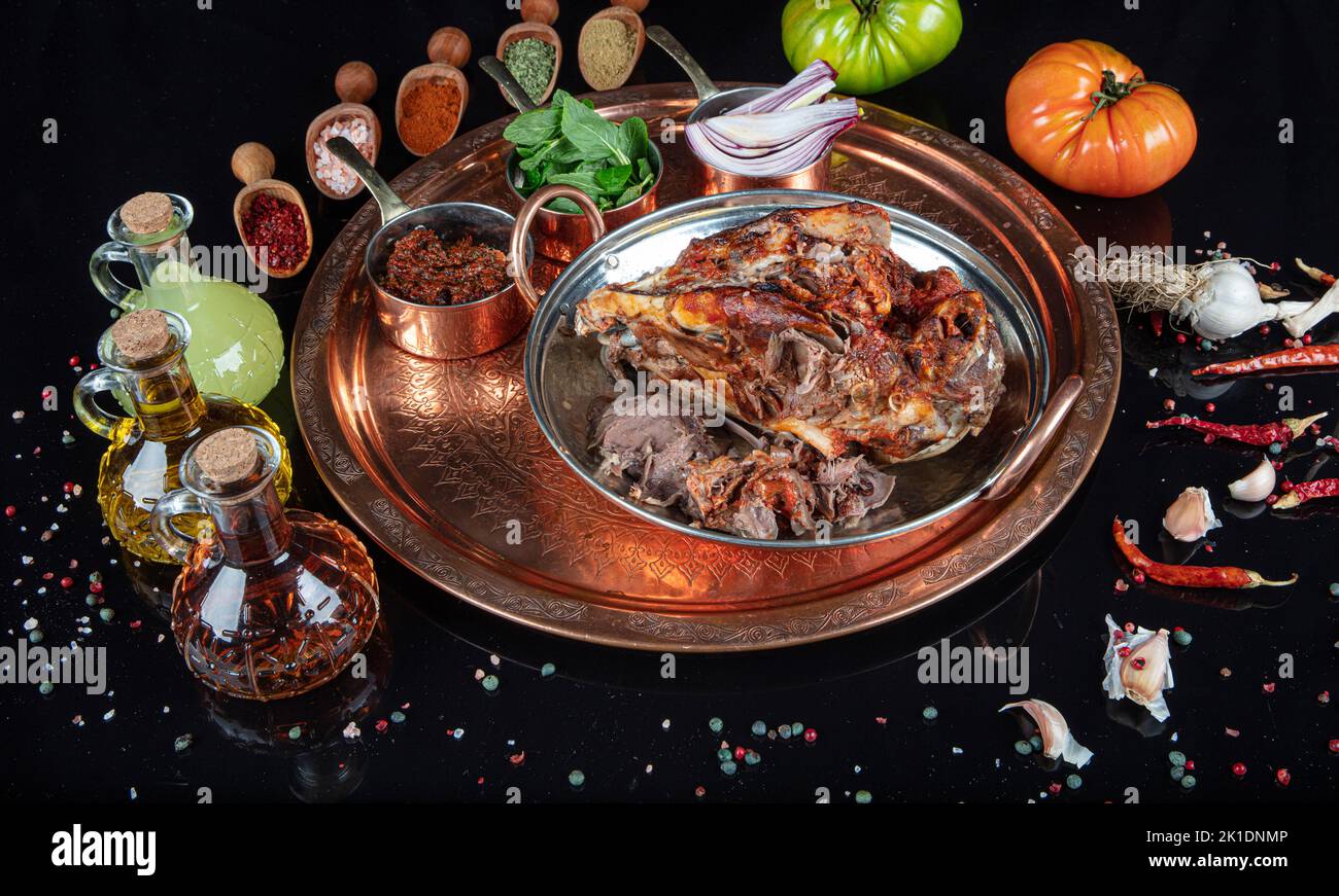 Roasting head of a lamb. Traditional Turkish Offal Food Kelle Sogus ...