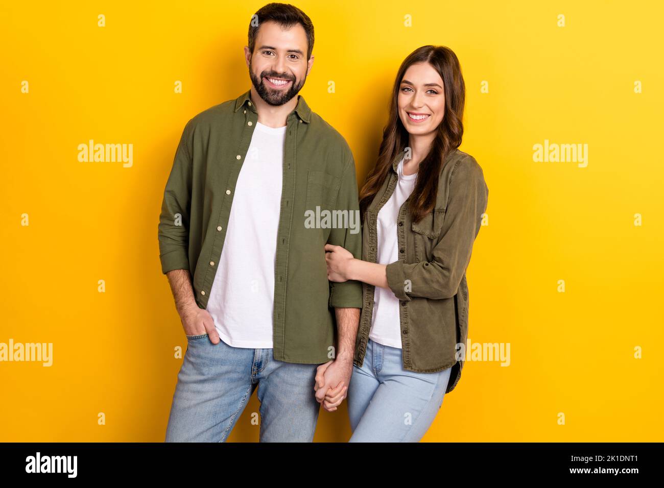 Photo of two cute people in relationship stand together wear matching ...